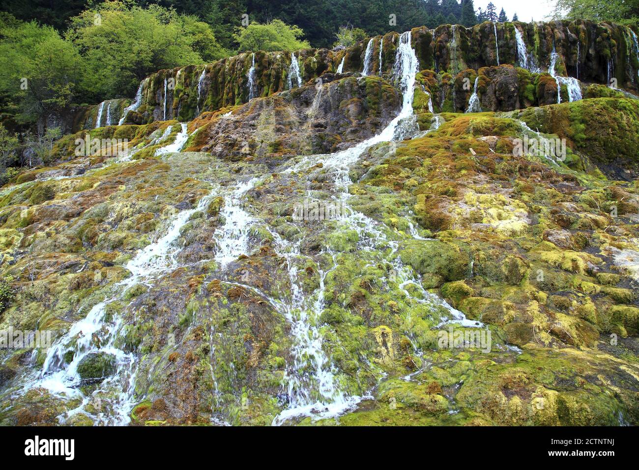 Sichuan Huanglong Flying Waterfall Stock Photo - Alamy