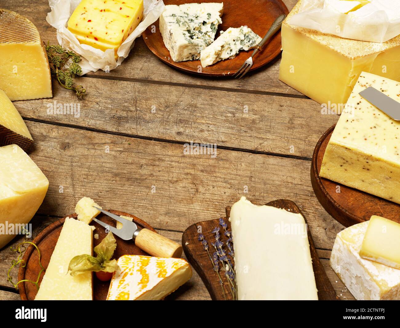 Various types of cheese on rustic background, with copyspace Stock ...