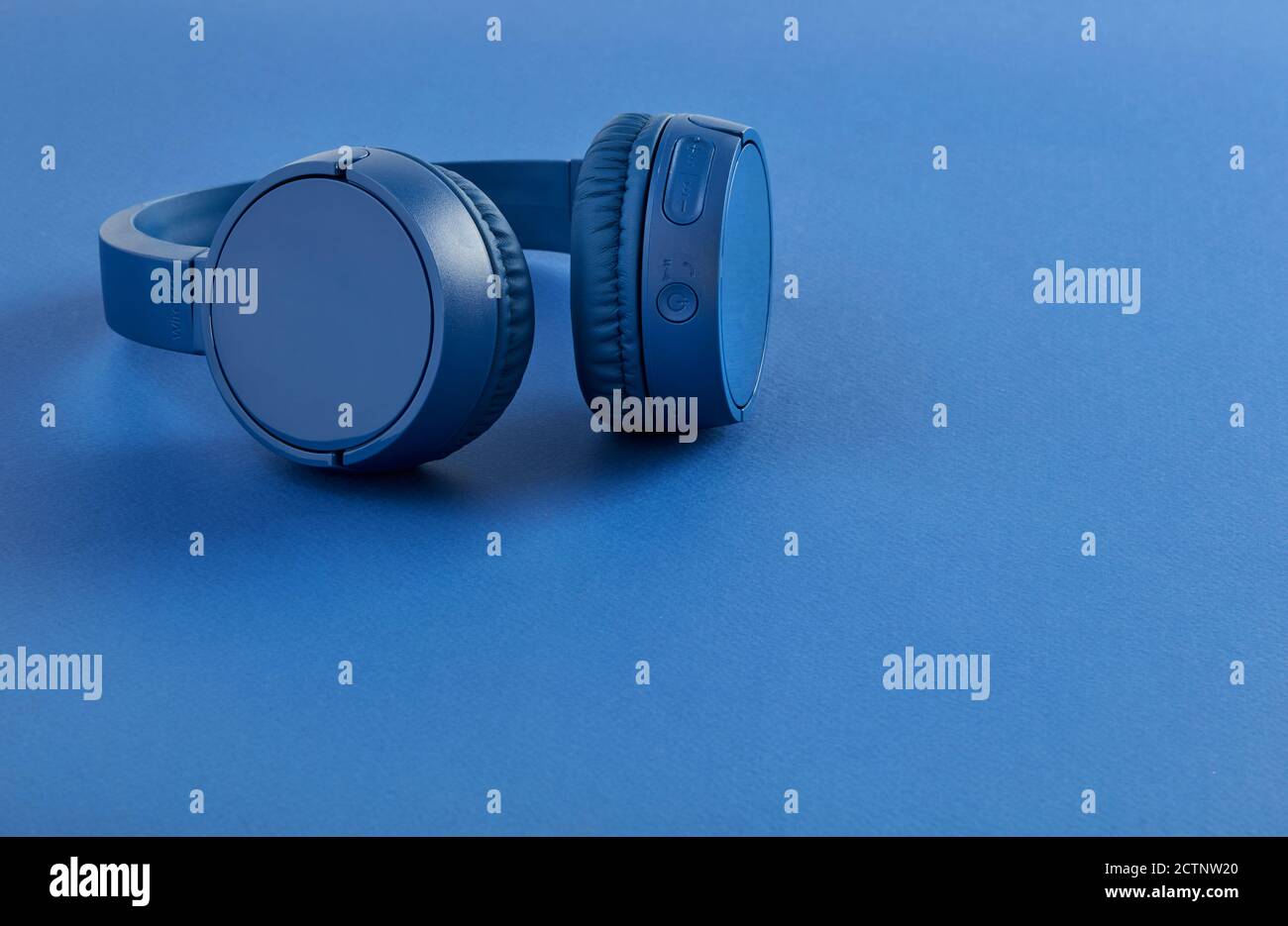 Blue wireless bluetooth headphones hi-res stock photography and images ...