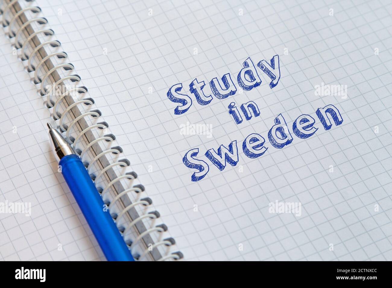 Text Study in Sweden handwritten on sheet of notebook Stock Photo - Alamy