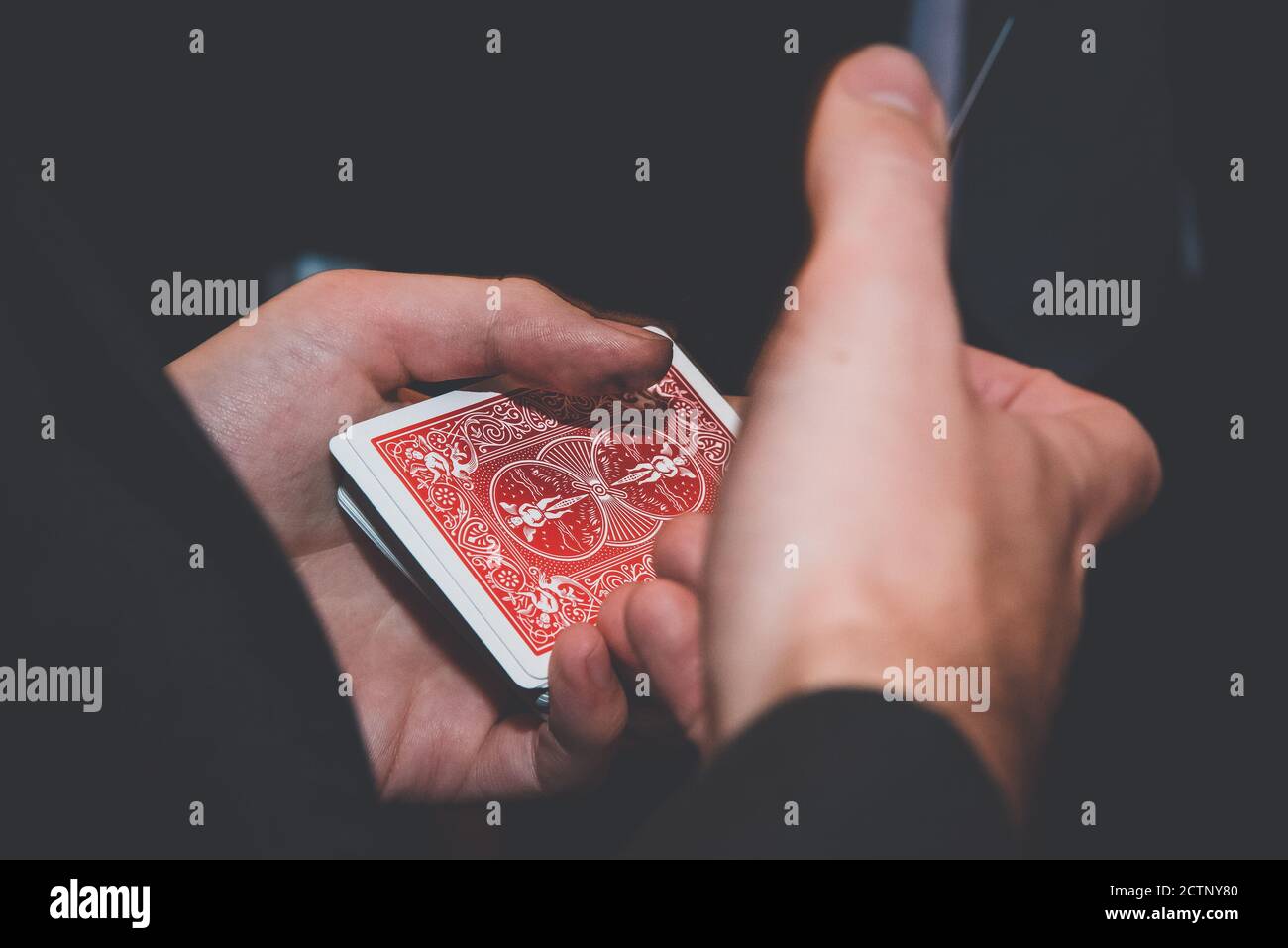 Magician giving cards hi-res stock photography and images - Alamy