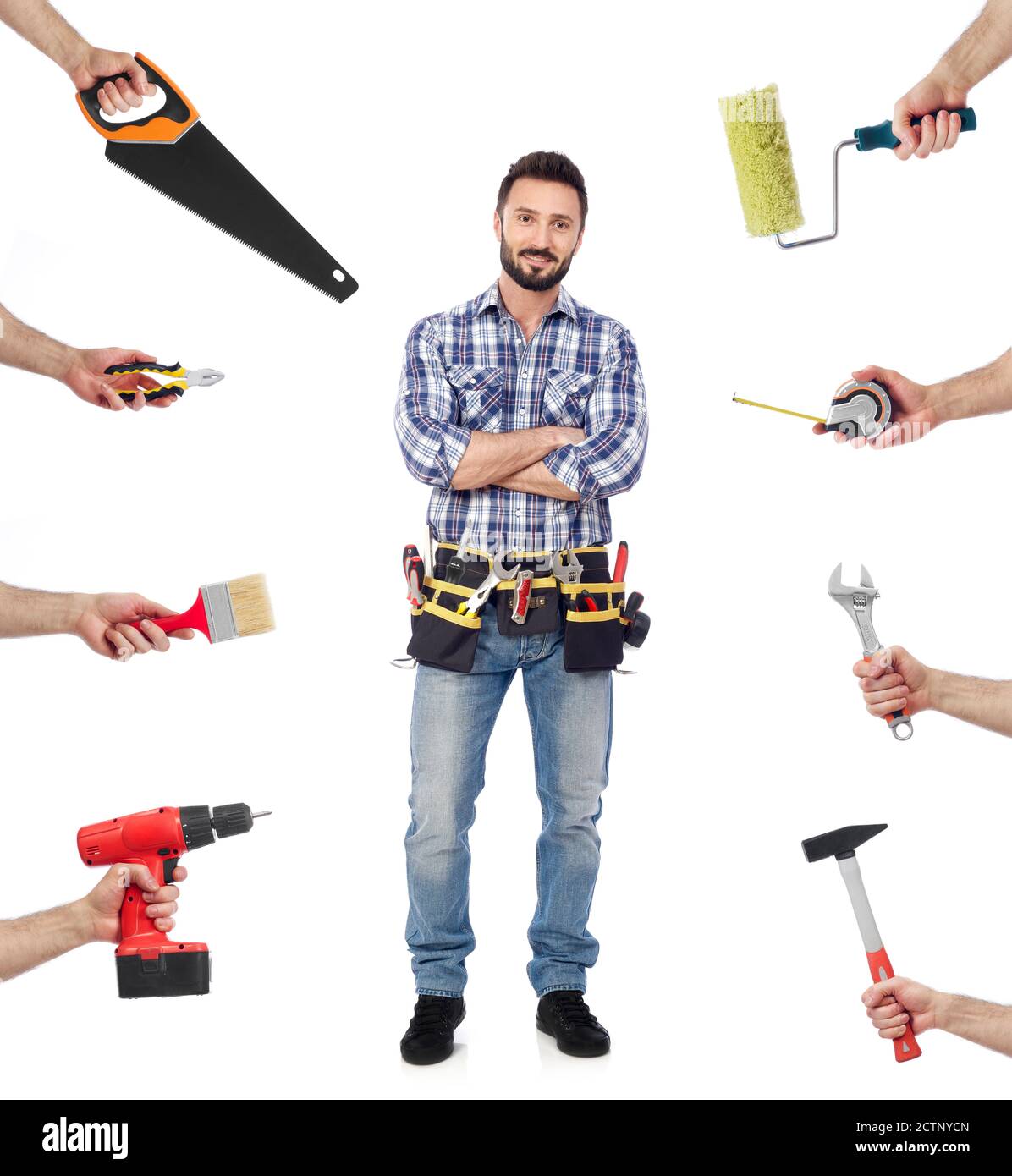 Cheerful carpenter looking at camera with tools all around, white ...