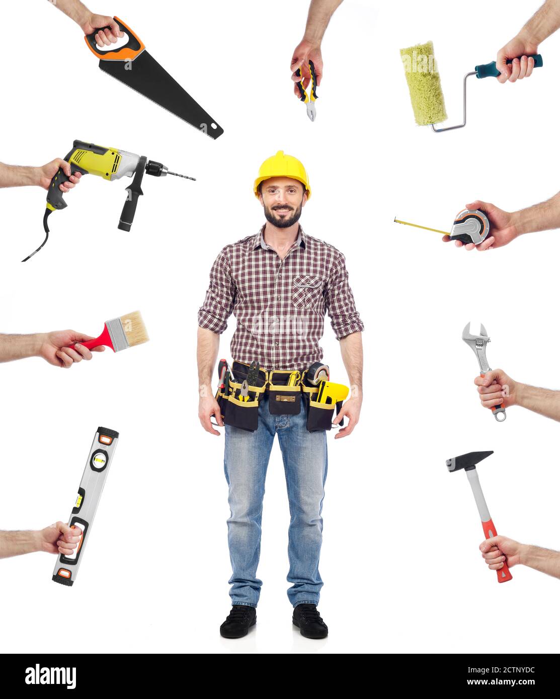 Cheerful carpenter looking at camera with tools all around, white ...
