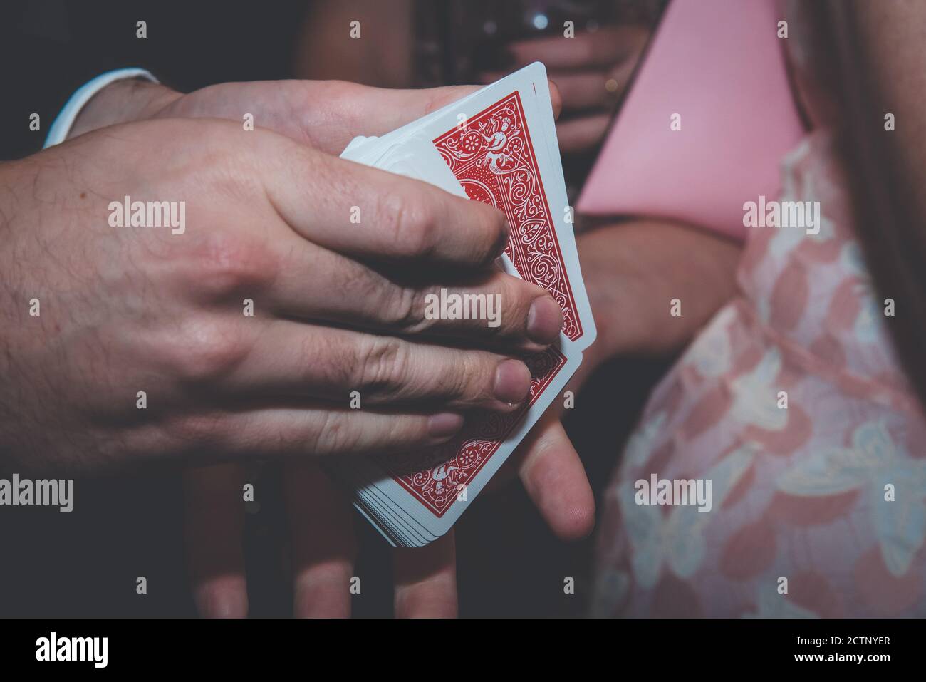Magician card tricks Stock Photo - Alamy