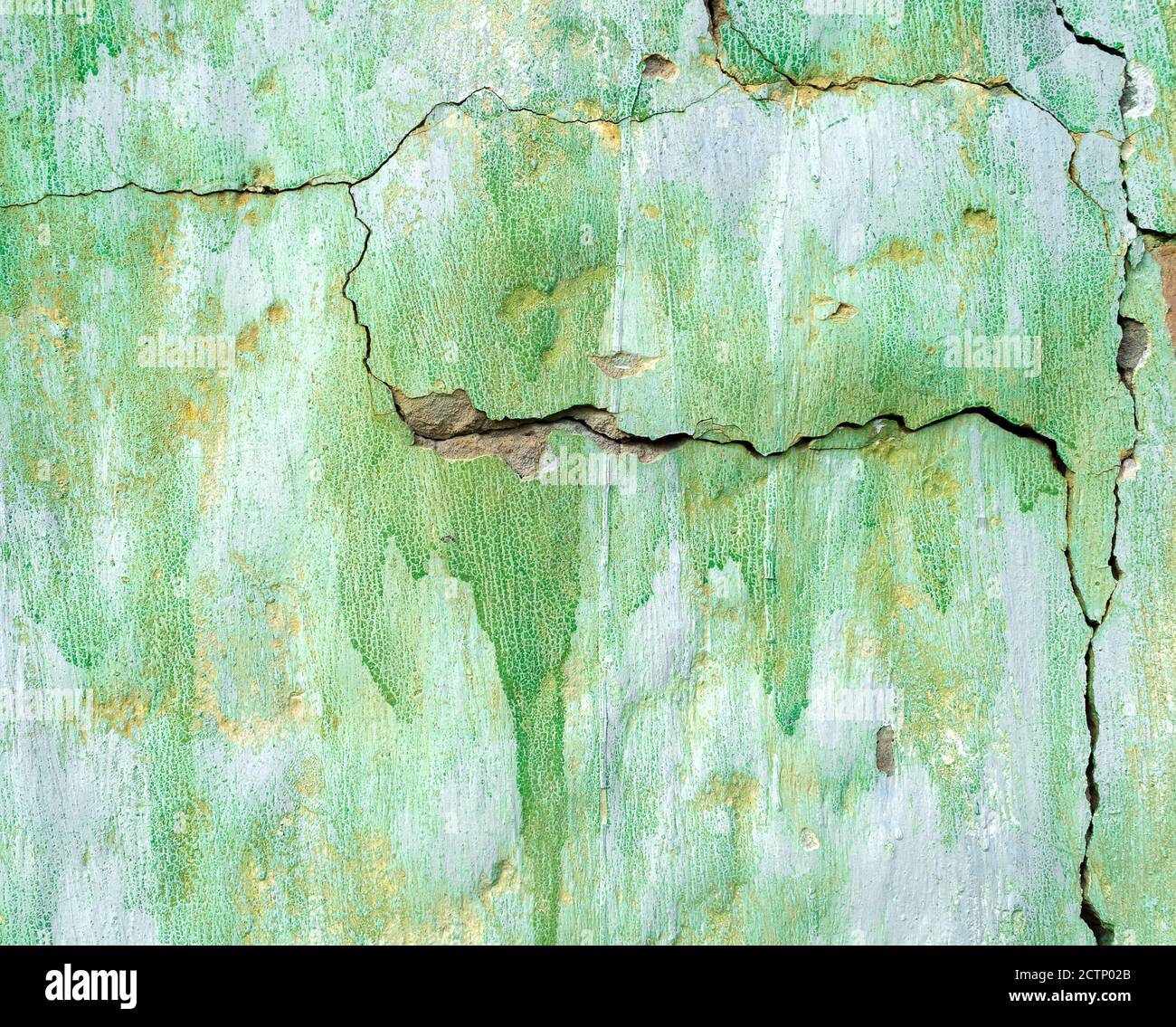 Green painted damaged grunge wall background or texture Stock Photo - Alamy
