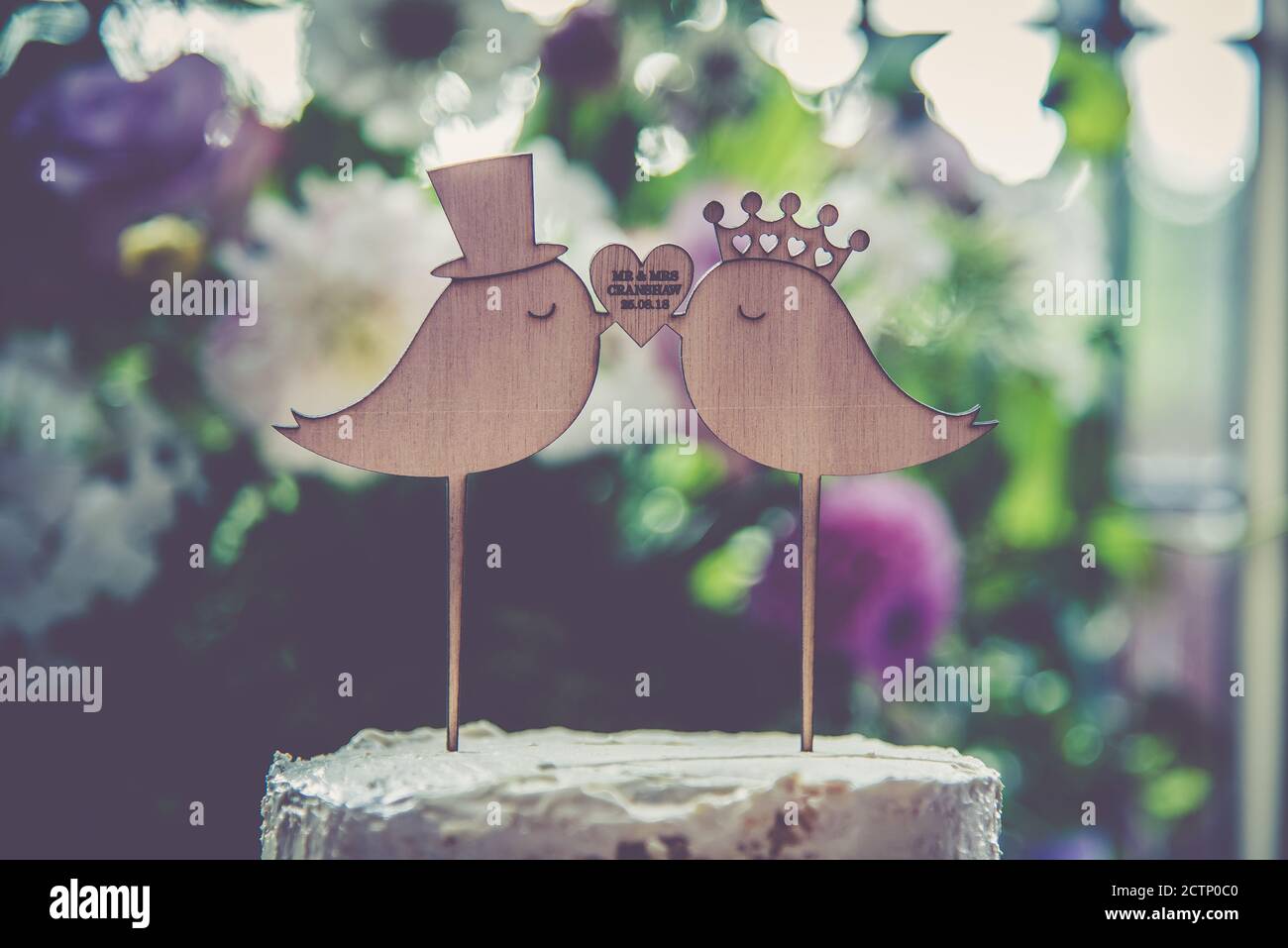 Custom made bird cake topper Stock Photo - Alamy