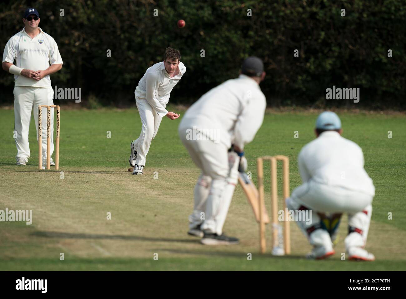 Bowler in action Stock Photo - Alamy