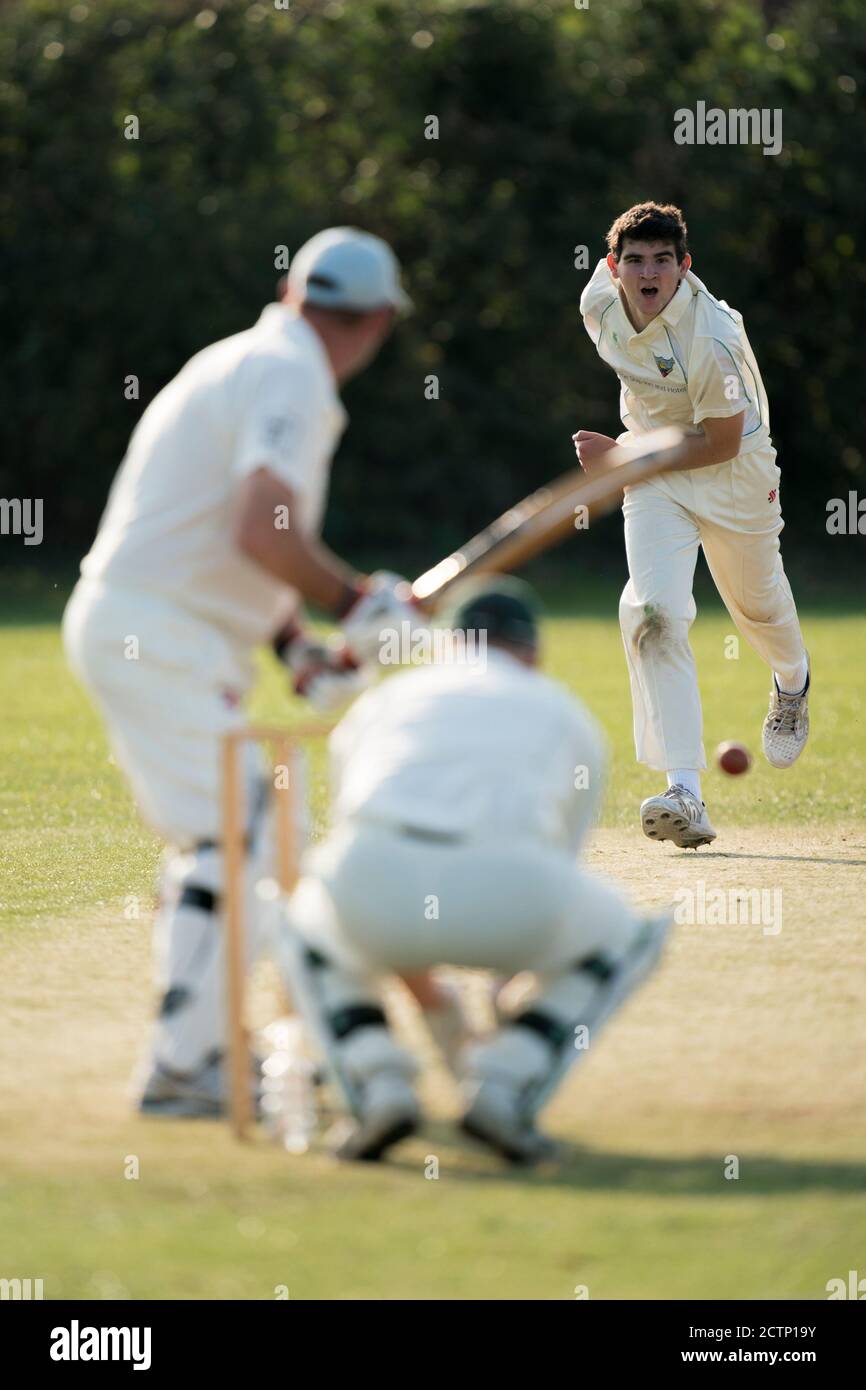Bowler in action Stock Photo - Alamy