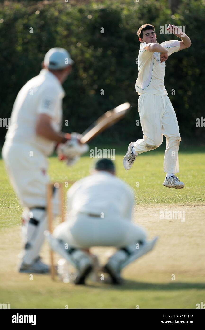 Bowler in action Stock Photo - Alamy