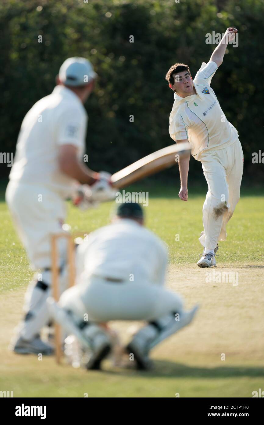 Bowler in action Stock Photo - Alamy