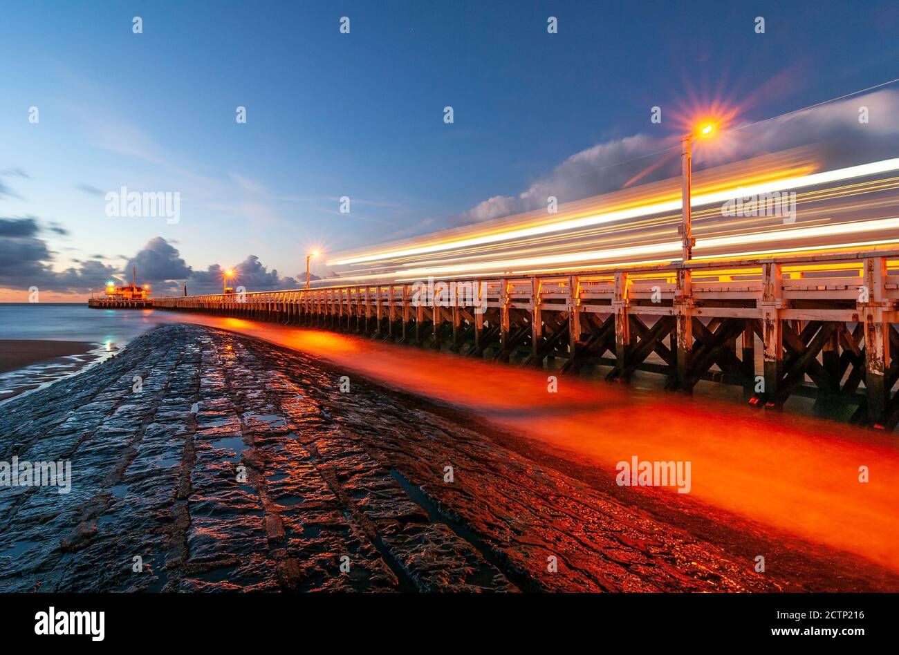 The pier of Oostende (Ostend) during the blue hour with long exposure ...