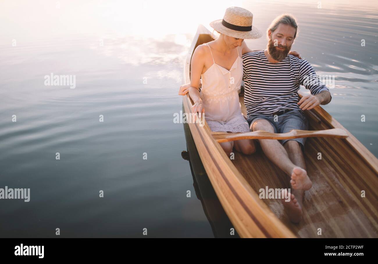 Couple enjoy boat trip Stock Photo - Alamy
