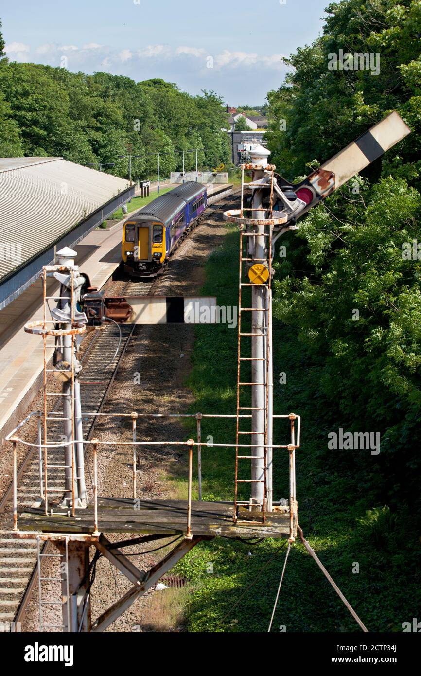 Northern Rail class 156 train passing the bracket semaphore signal at ...