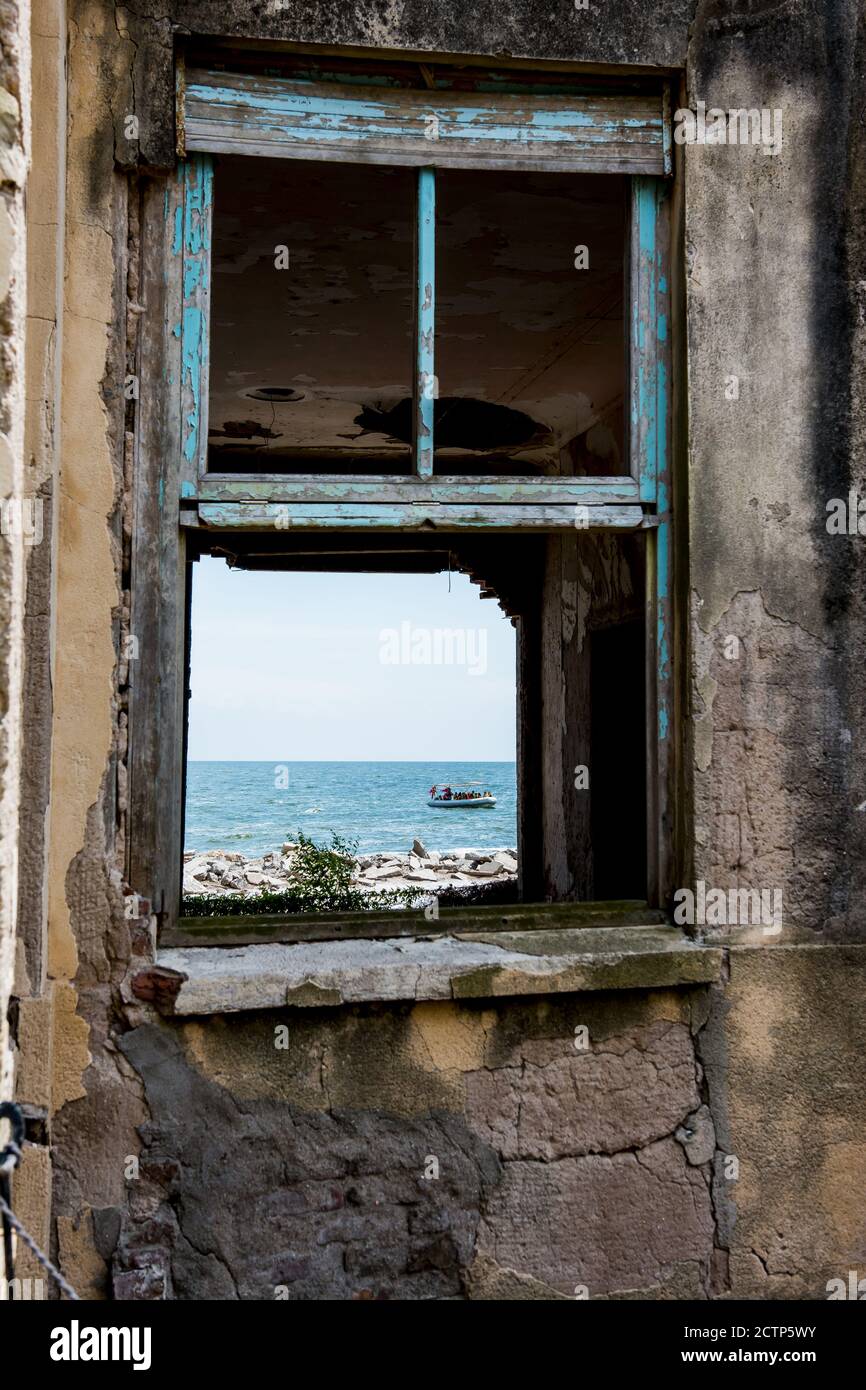 Sea view through an old weathered window Stock Photo - Alamy