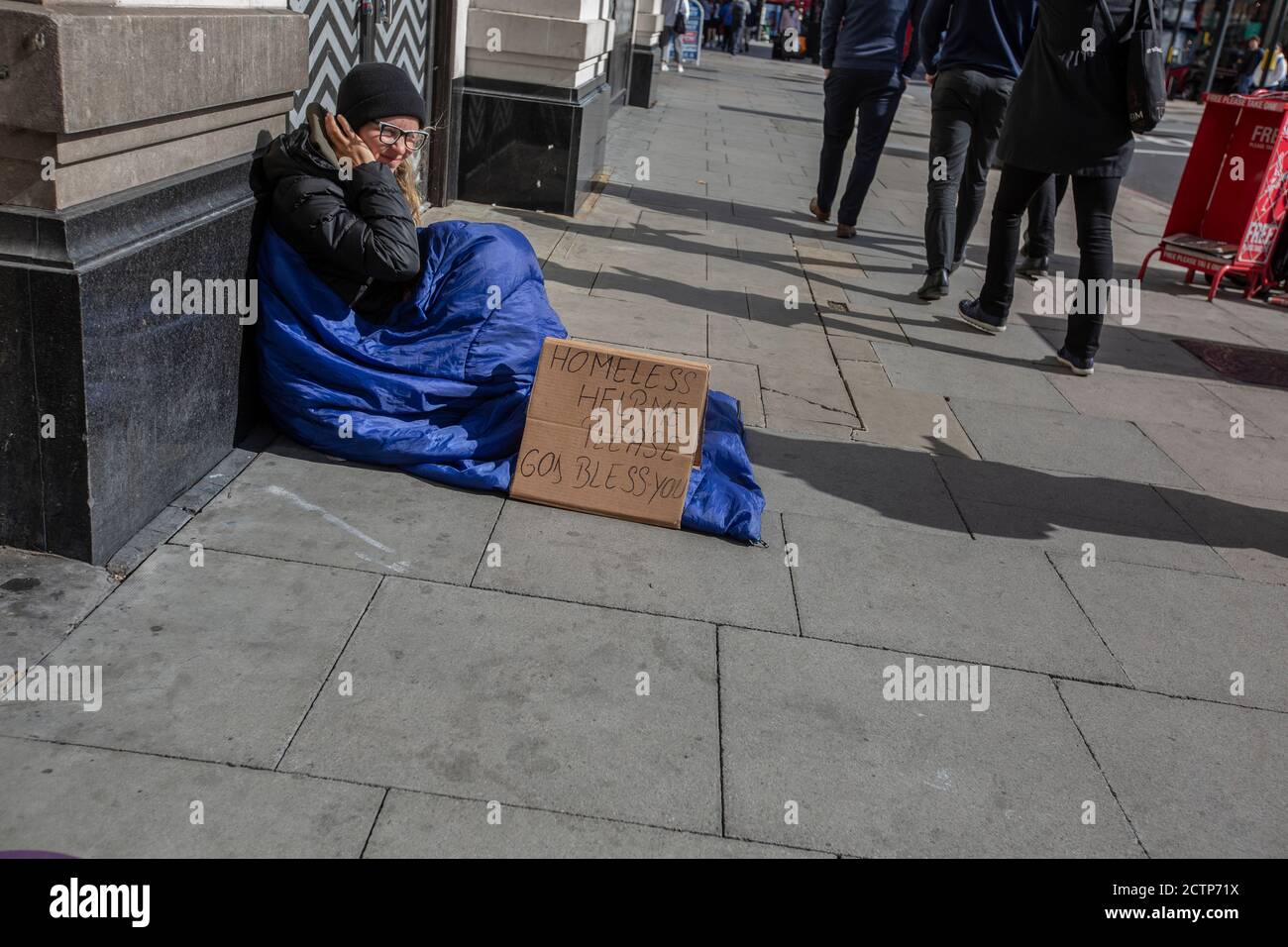 Homeless woman begging for help on Oxford Street, central London ...
