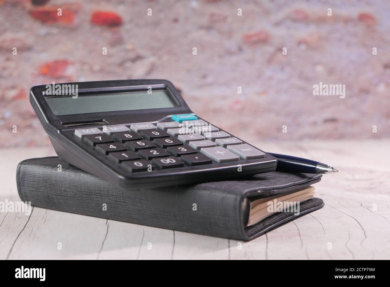 Close up of blue calculator and notepad on color background Stock Photo ...