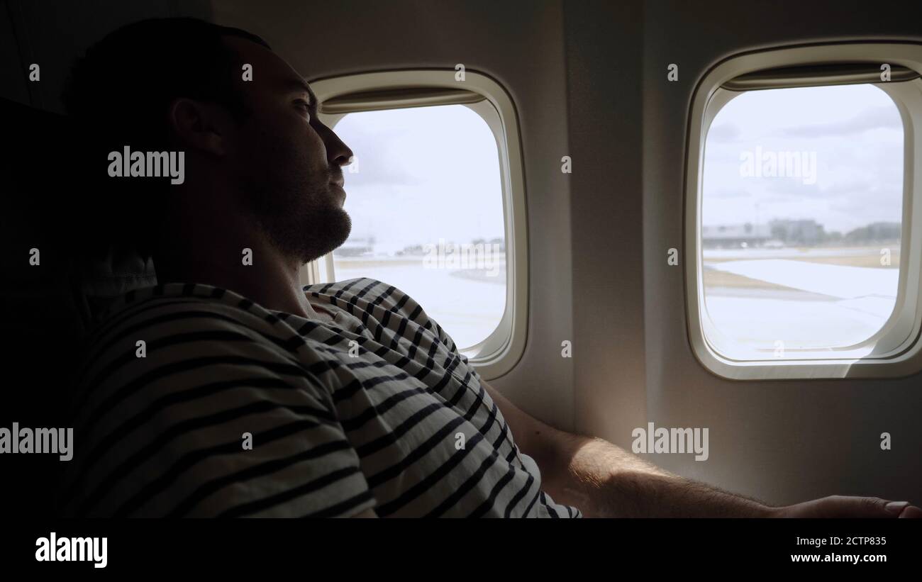 Person Sitting Airplane Looking Outside High Resolution Stock ...