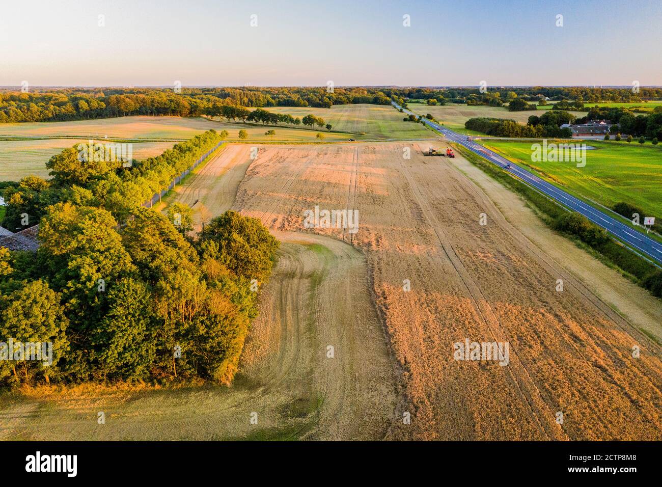 Vejen, Denmark. 01st, September 2020. A farmer is harvesting a barley ...
