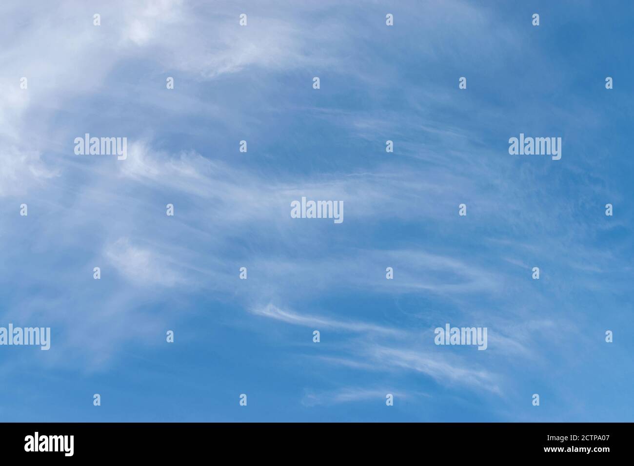 White cirrus clouds on a blue sky, background and pattern Stock Photo ...