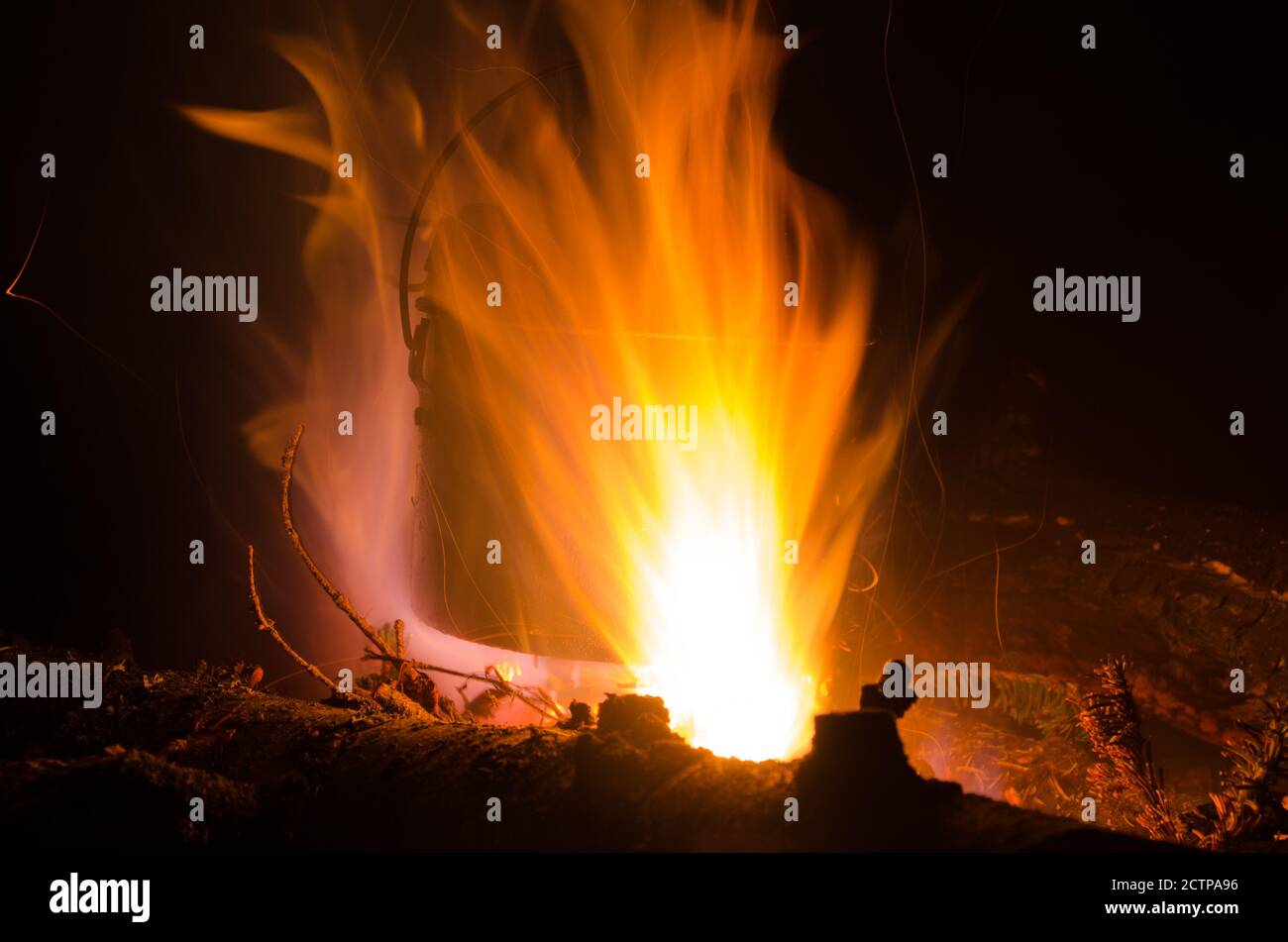 fire burns in the campaign. pot of tea by the fire Stock Photo - Alamy