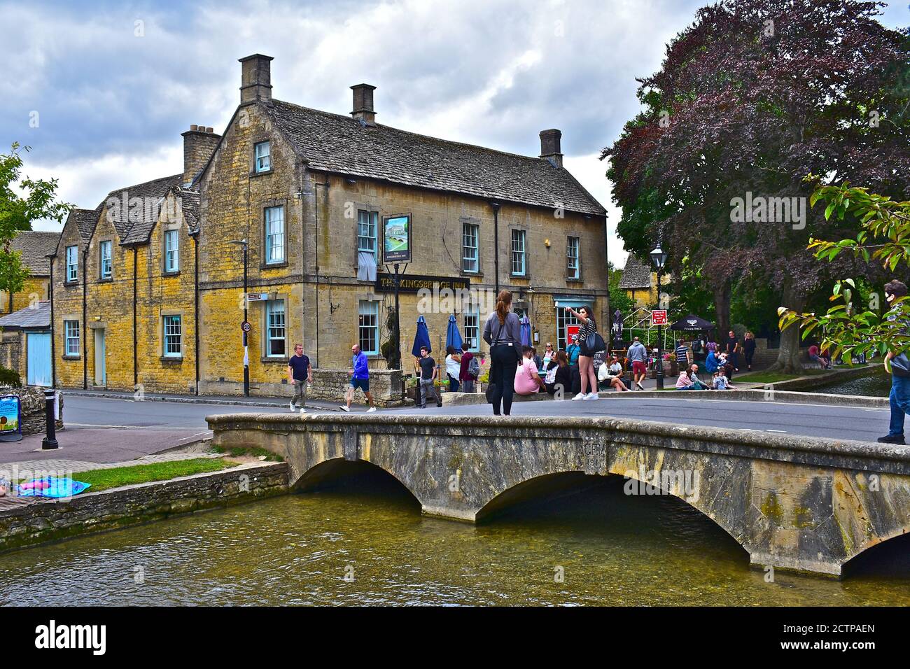 A view across the river Windrush where it passes through the centre of ...