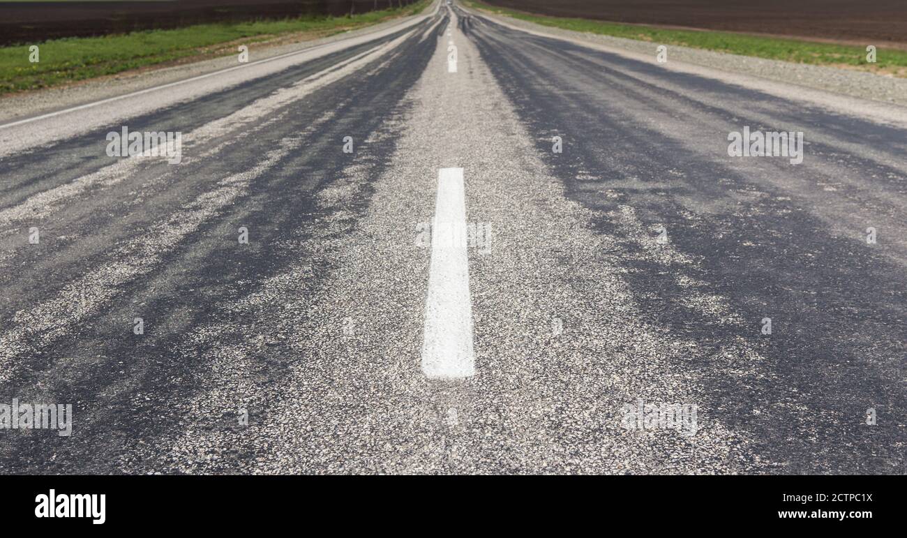 asphalt paving on highway turn close up Stock Photo - Alamy