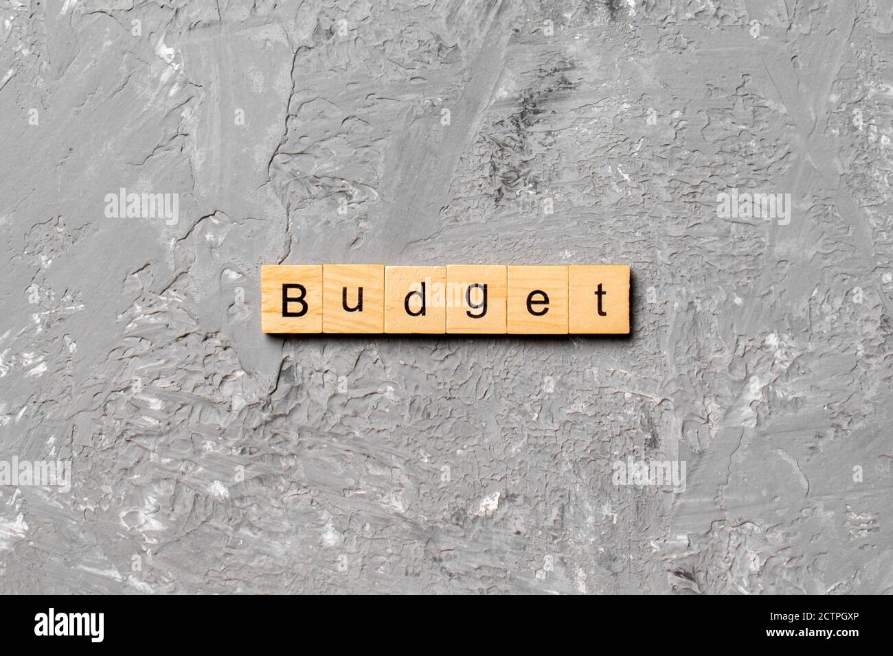 budget word written on wood block. budget text on table, concept Stock ...