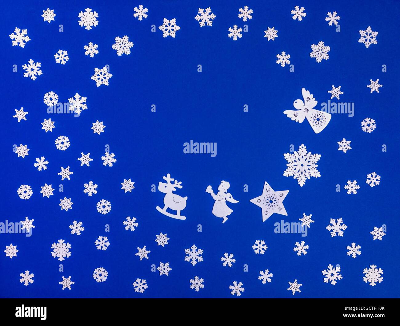 Blue festive Christmas background with Xmas symbols and snowflakes ...