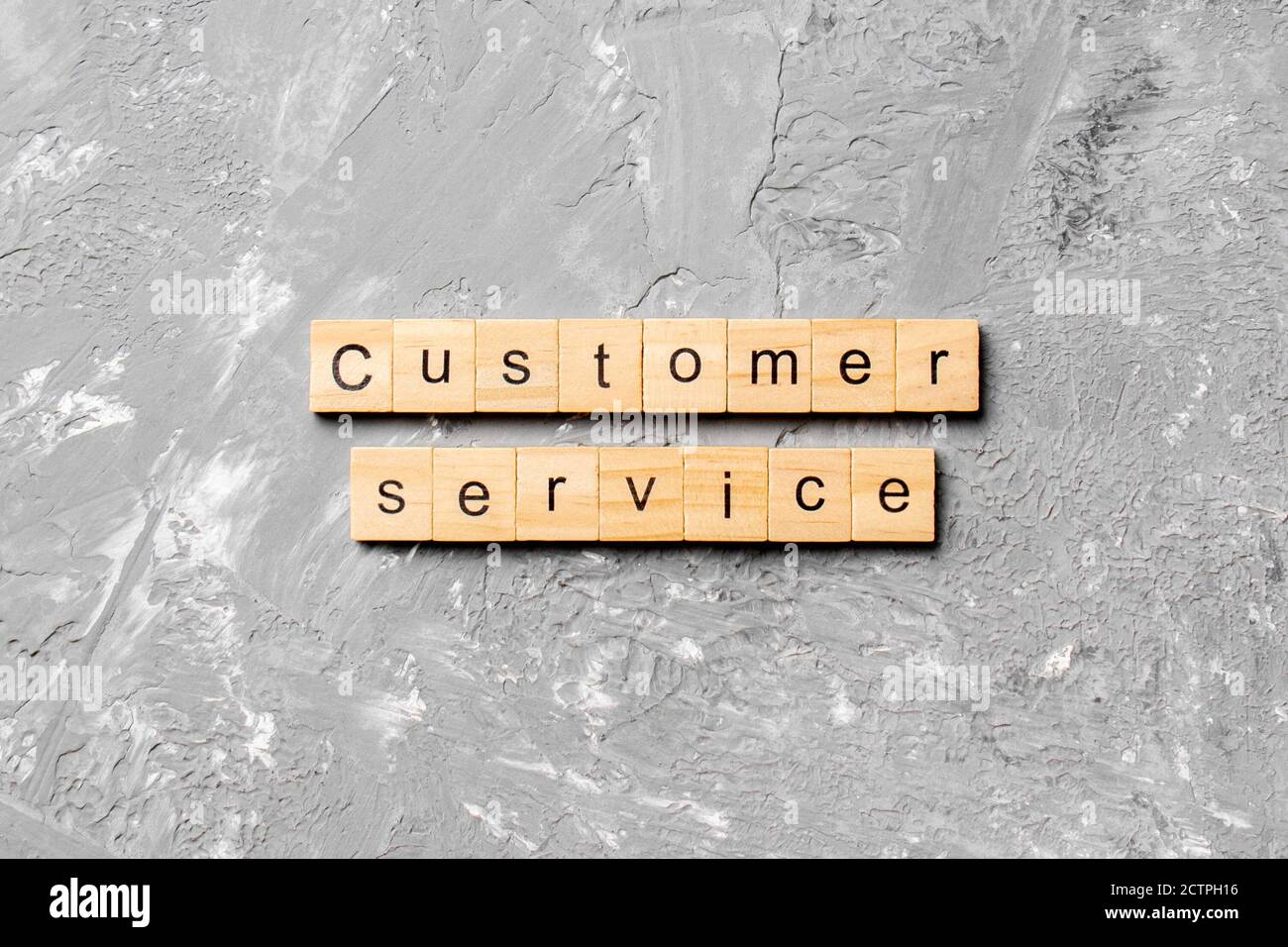 customer service word written on wood block. customer service text on ...