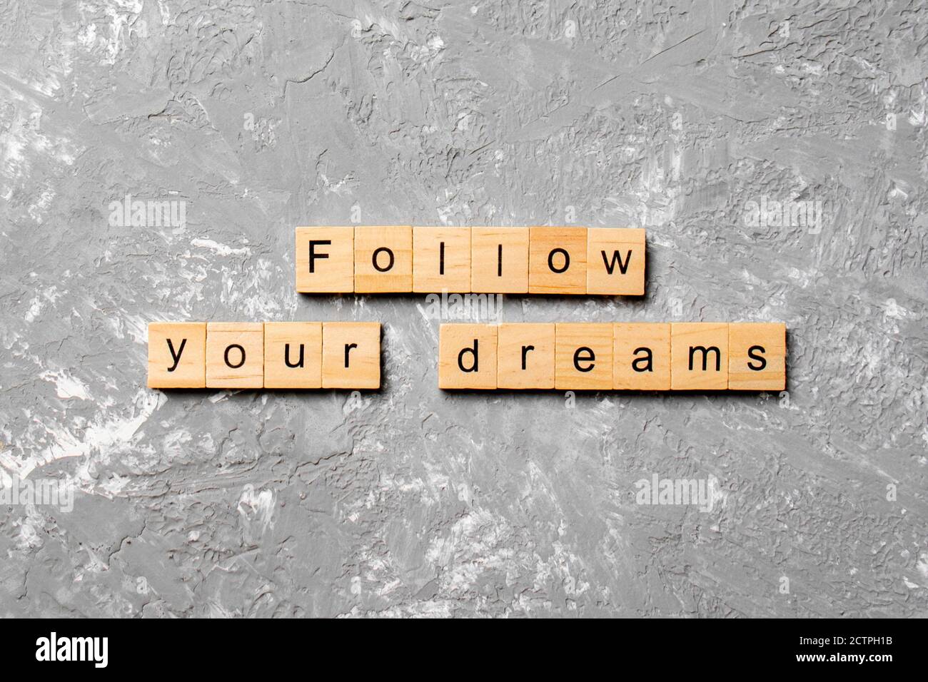 Follow your dreams word written on wood block. Follow your dreams text ... Follow your dreams word written on wood block. Follow your dreams text ...