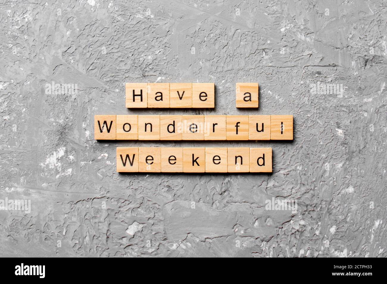 Have a wonderful weekend word written on wood block. Have a wonderful ...