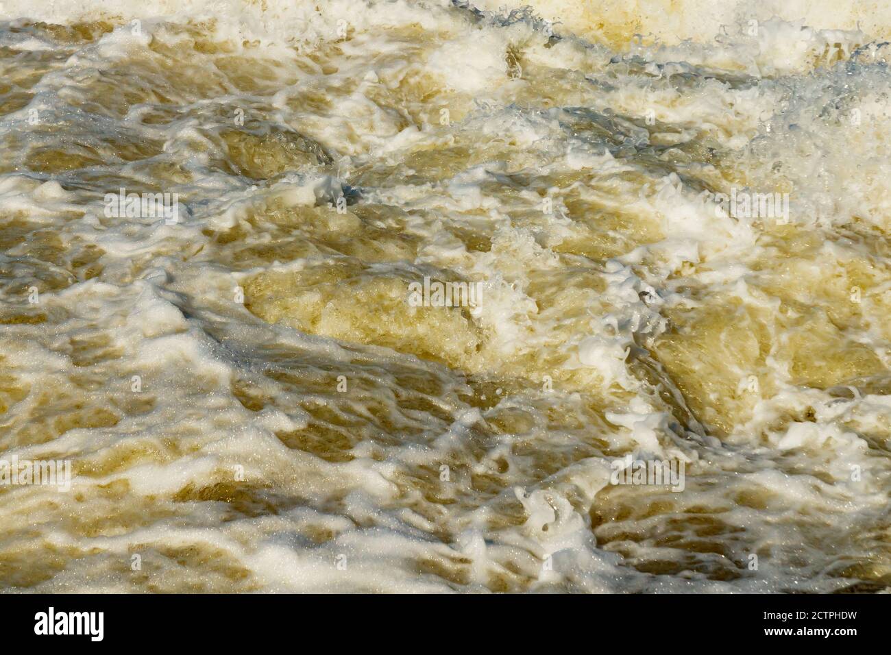 Splashing water waves on the fast river Stock Photo - Alamy