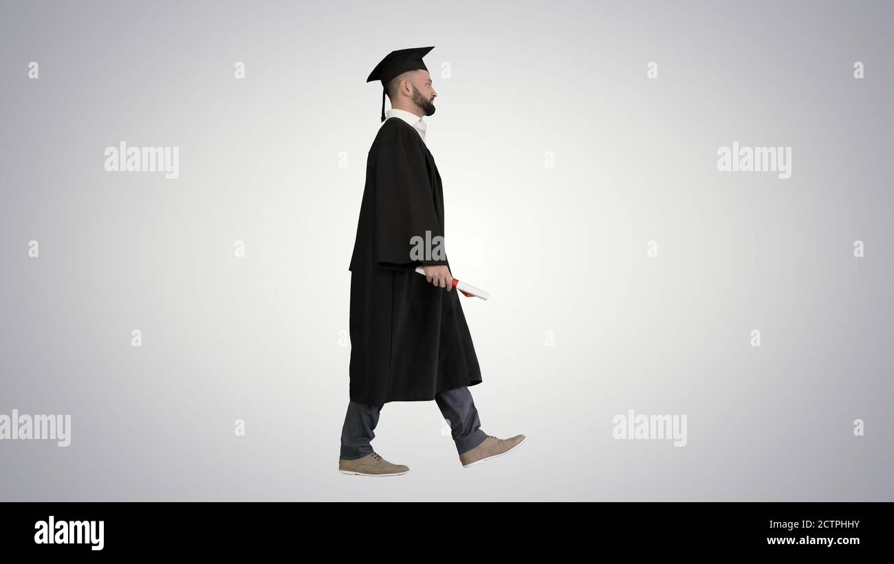 Happy and excited graduate student walking on gradient backgroun Stock ...