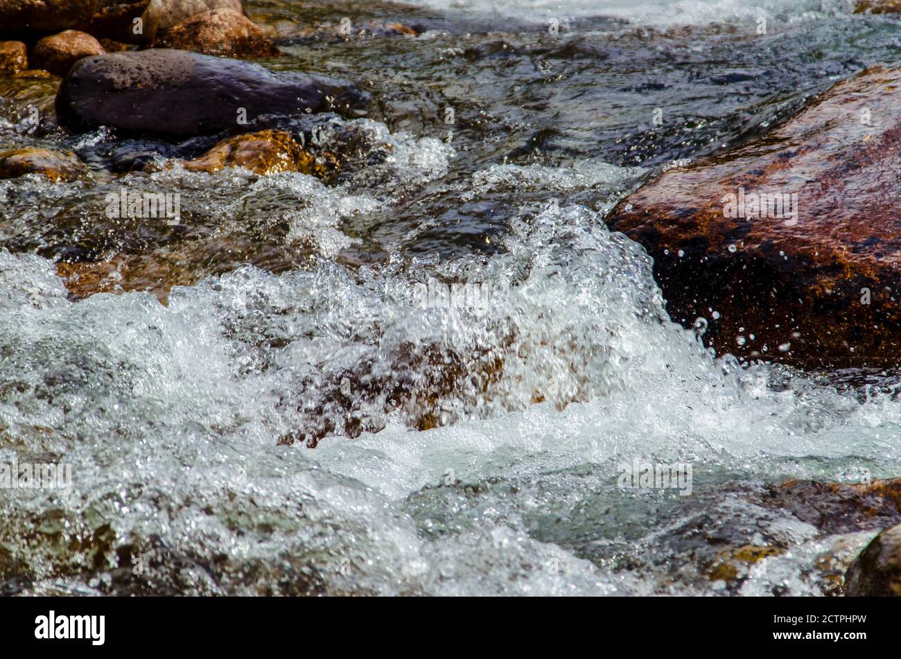 in summer rocky mountain river water silk. mountain river Stock Photo ...