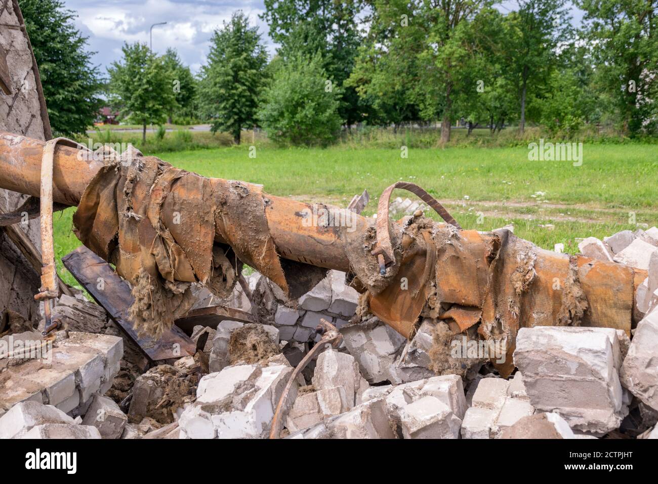 fragments of white brick ruins, remnants of an old iron structure from ...
