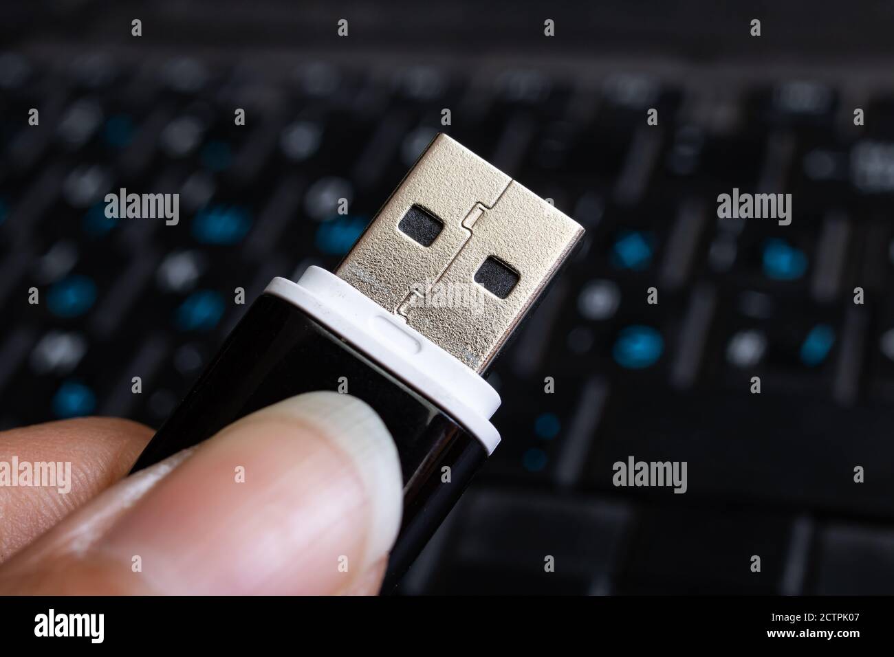 USB flashcard on laptop keyboard close up Stock Photo - Alamy