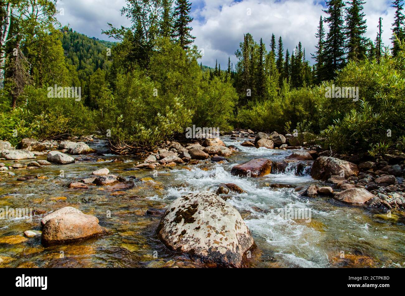 in summer rocky mountain river water silk. mountain river Stock Photo ...