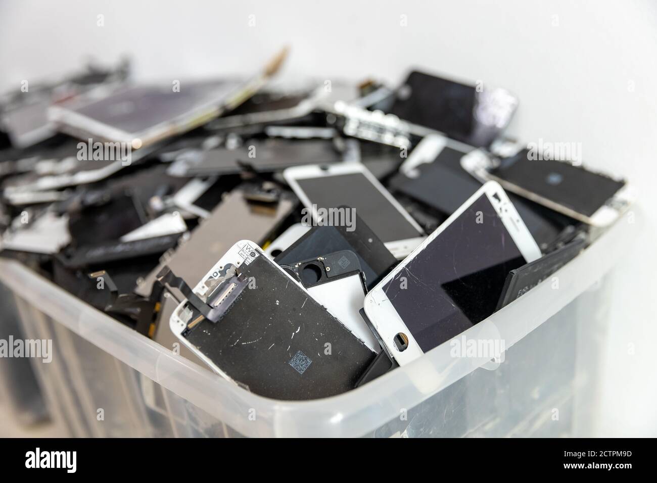 Broken iPhone Apple phone screens and used rechargeable batteries in ...