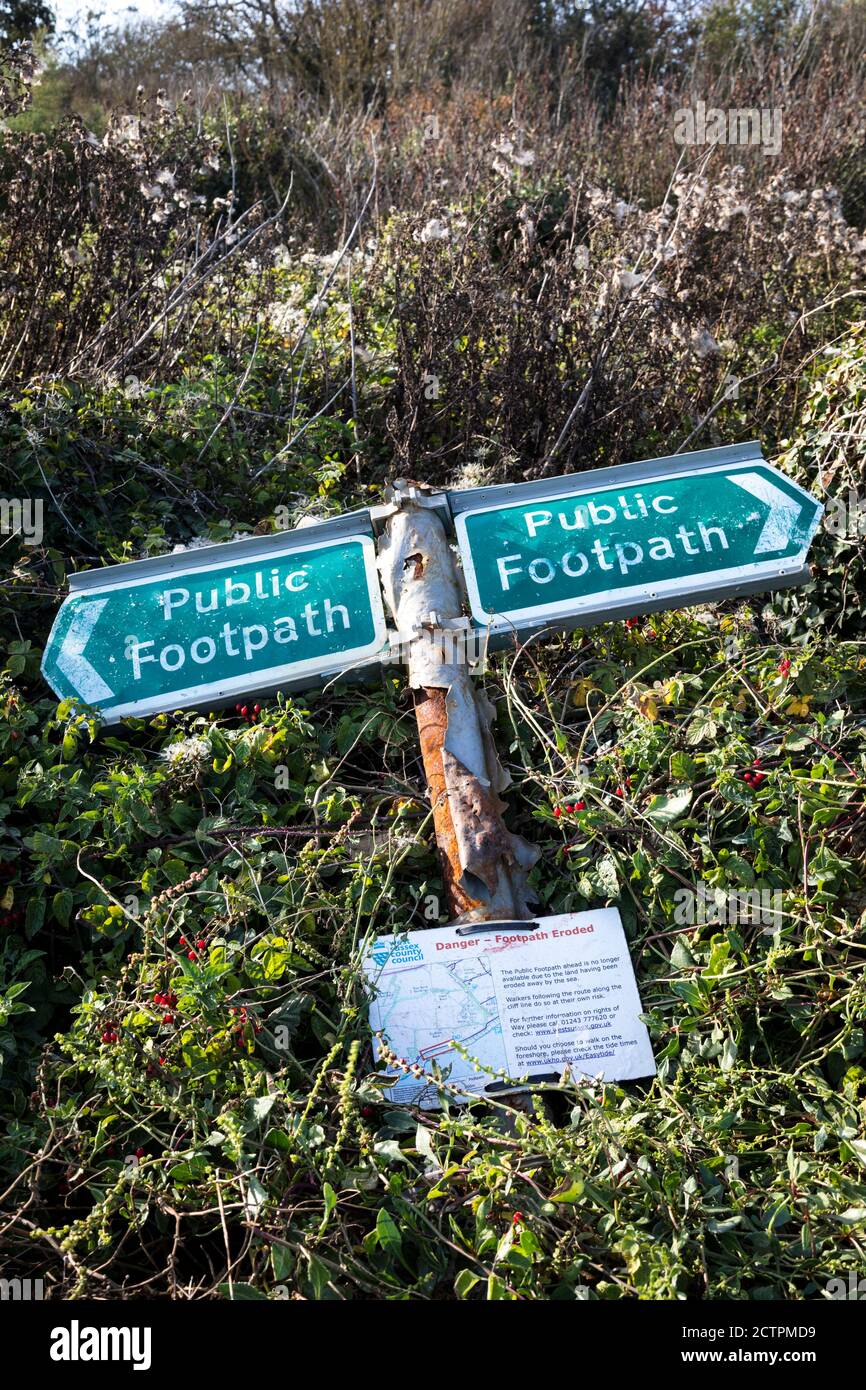 Broken footpath sign hi-res stock photography and images - Alamy