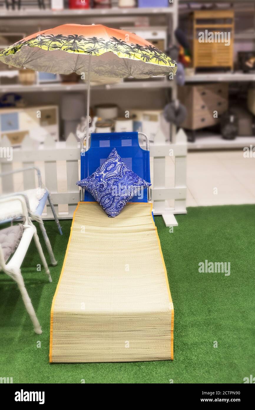 Outdoor summer chair at the store isolated Stock Photo - Alamy