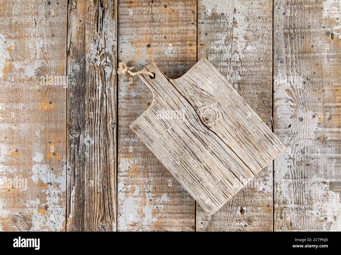Wooden distressed weathered background with kitchen board Stock Photo ...