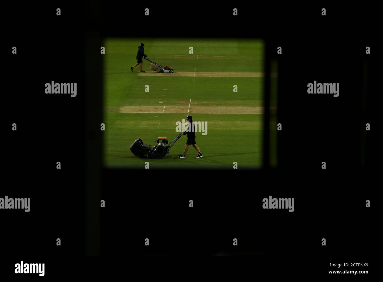 General view ground staff cutting grass hi-res stock photography and ...