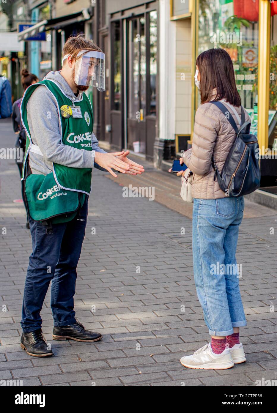 Employee of charity 'Concern' (charity mugger/chugger) wearing face ...