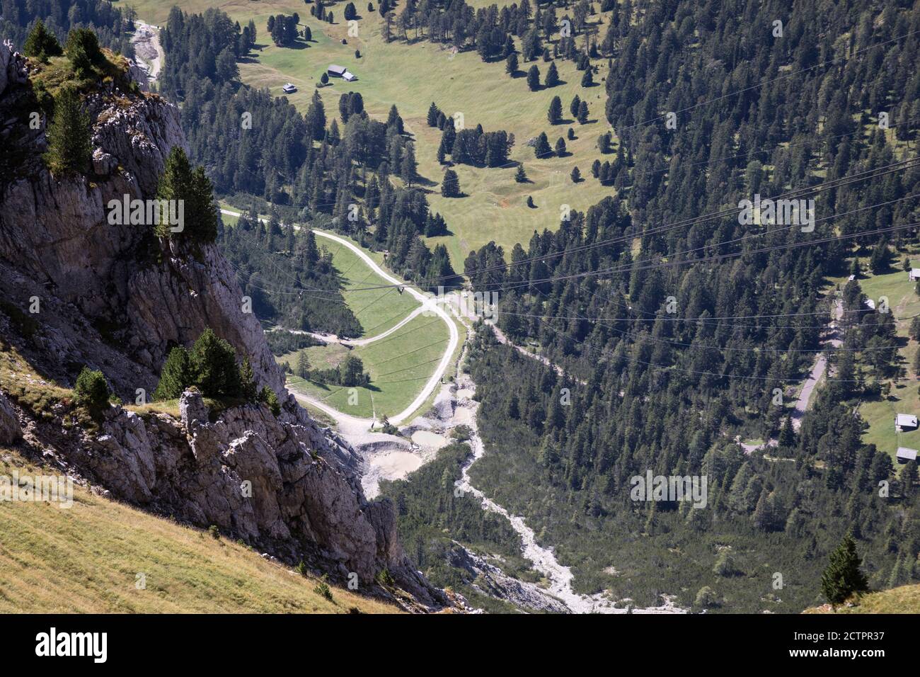View from the top station looking down along the cables of the Seceda ...