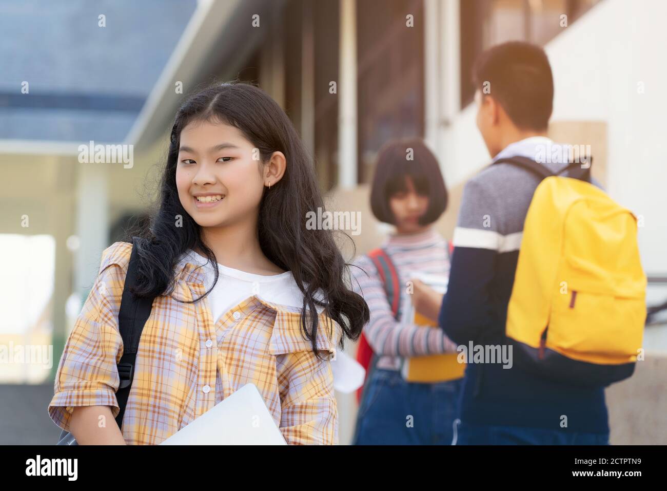 young student teenager girl high school student carrying schoolbag ...