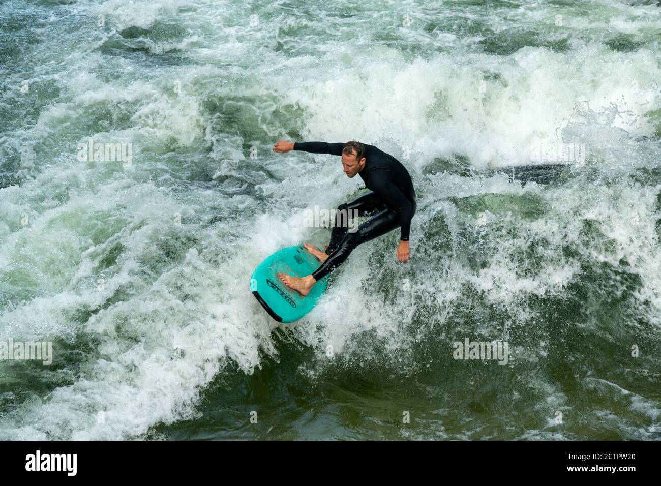 Munich, Bavaria / Germany - 17 September 2020: man surfing the standing ...