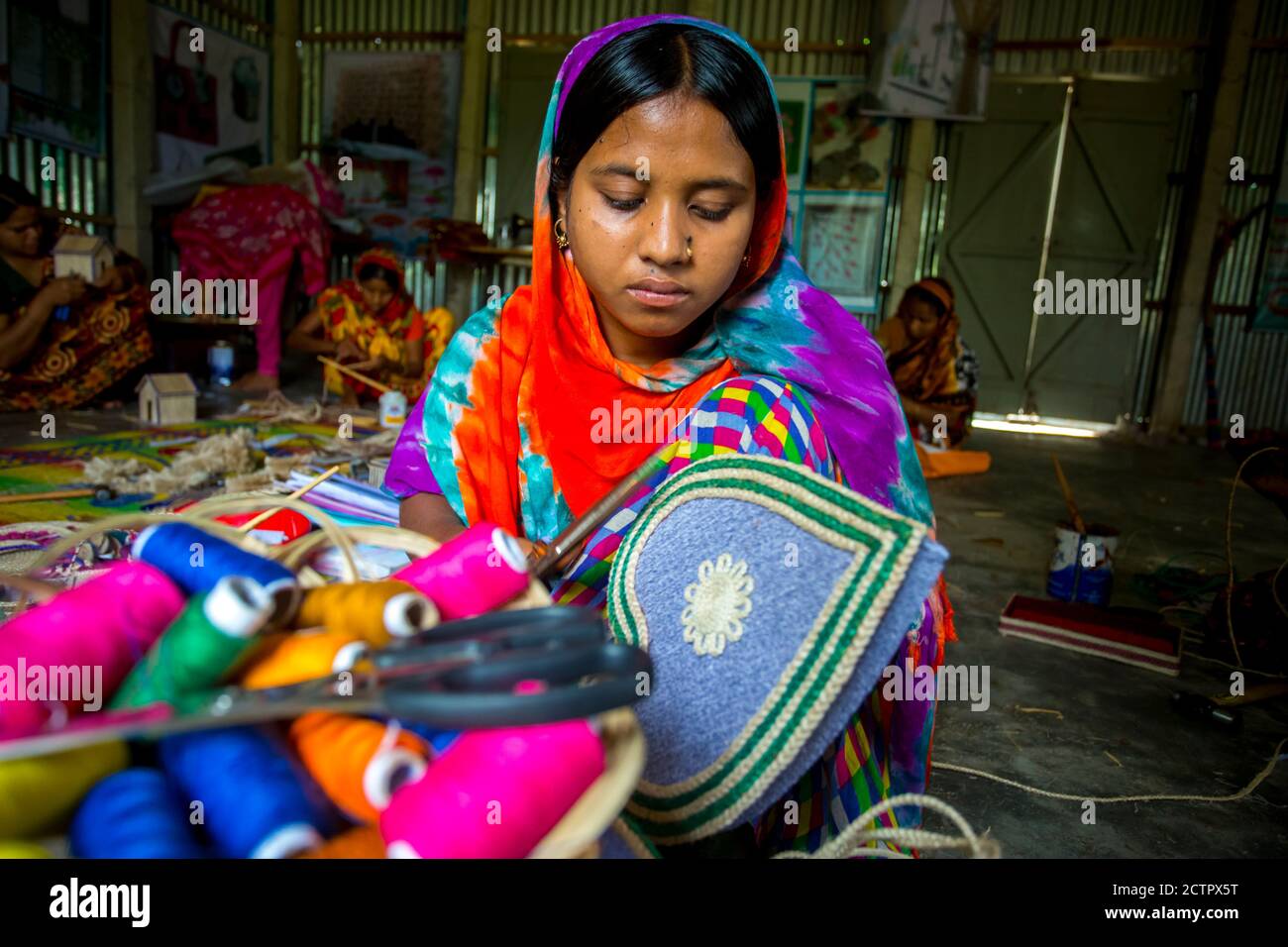 Bangladesh – May 13, 2018: A village Handicraft maker girl are making ...