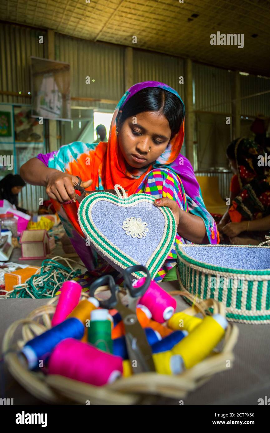 Bangladesh – May 13, 2018: A village Handicraft maker girl are making ...