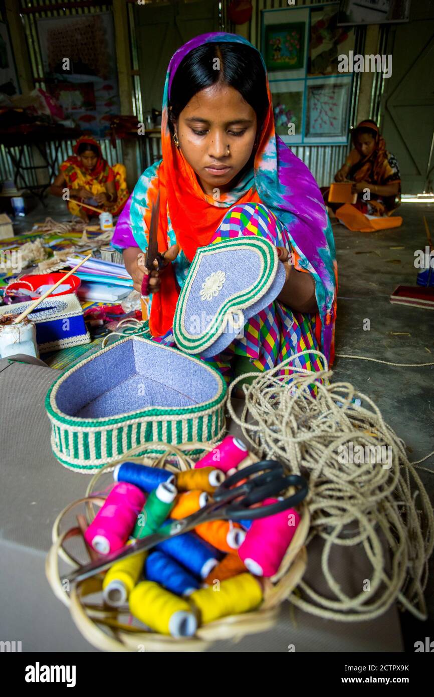 Bangladesh – May 13, 2018: A village Handicraft maker girl are making ...
