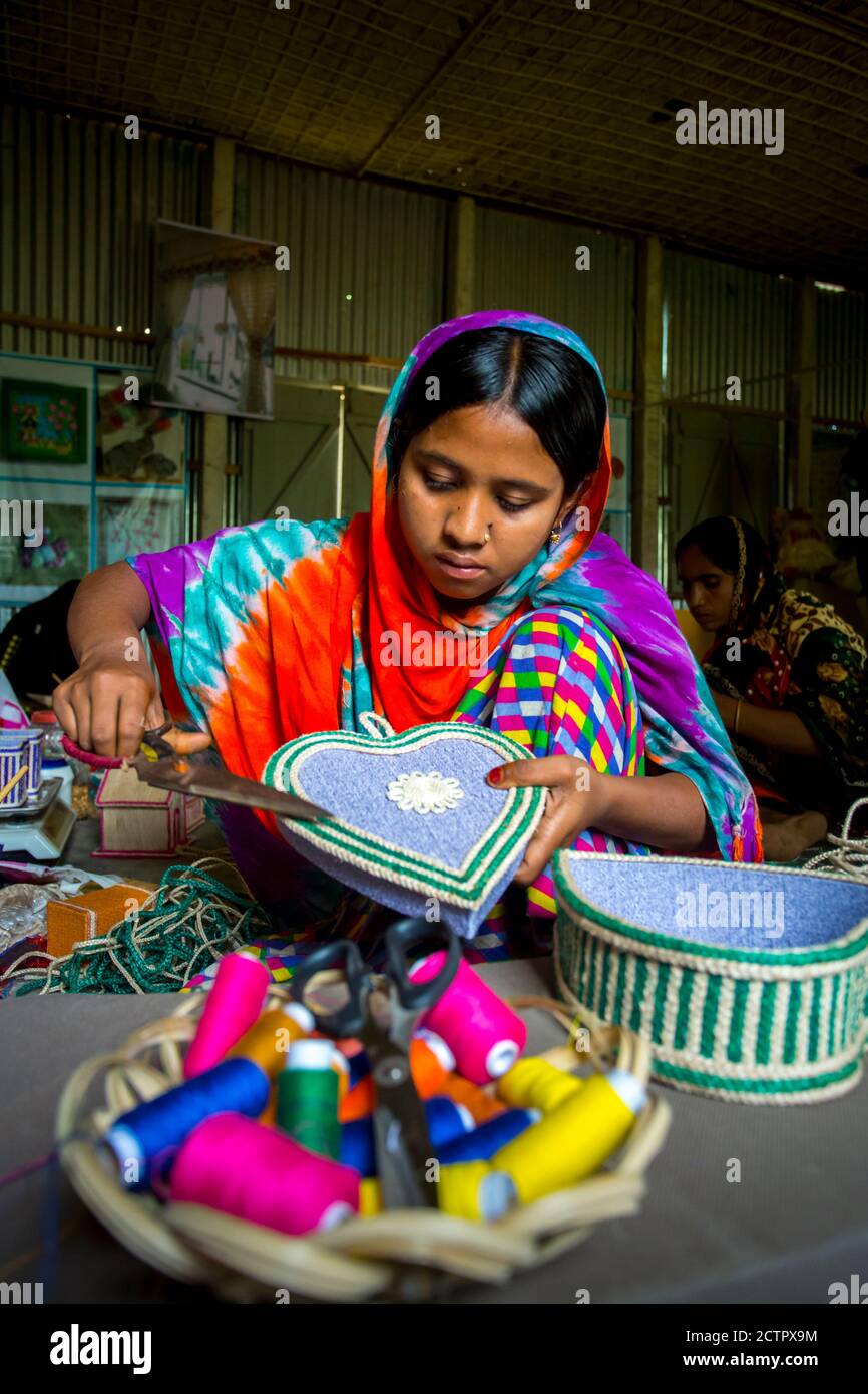 Bangladesh – May 13, 2018: A village Handicraft maker girl are making ...